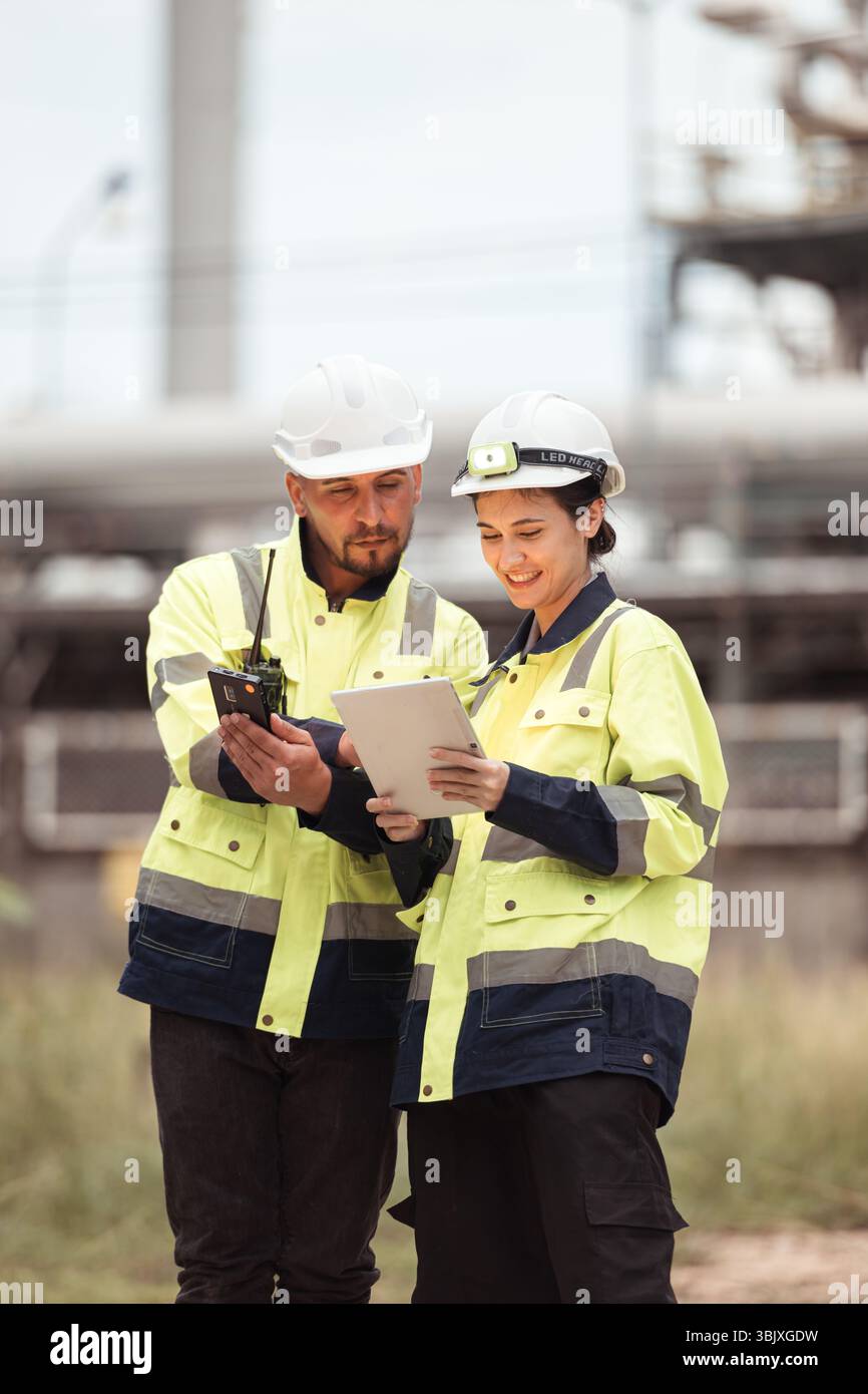 Both of Petroleum engineer is on a mission to inspect oil distillation ...