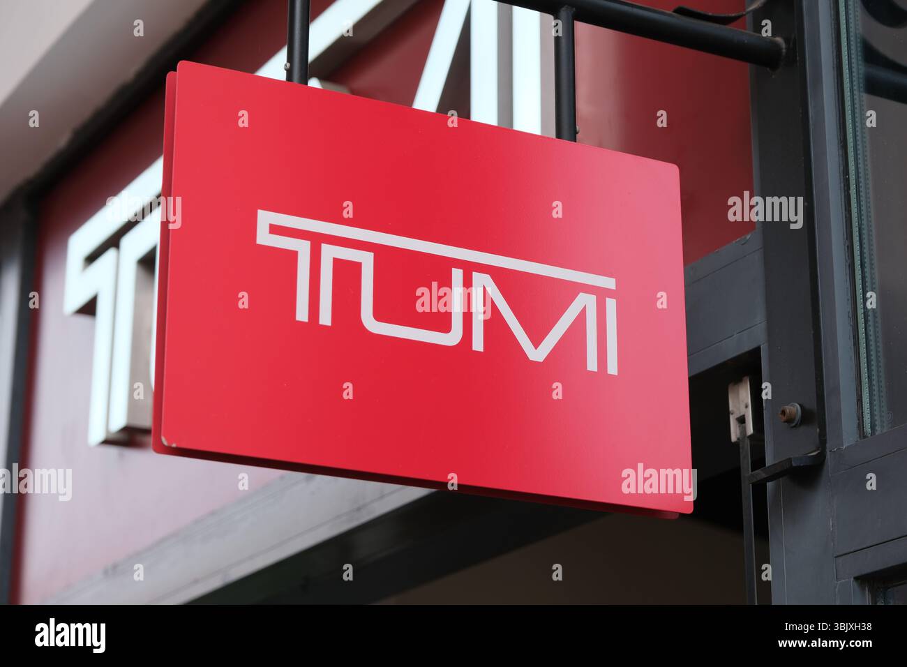 Shanghai,China-April 5th 2025: Tumi brand company logo on store Stock Photo - Alamy