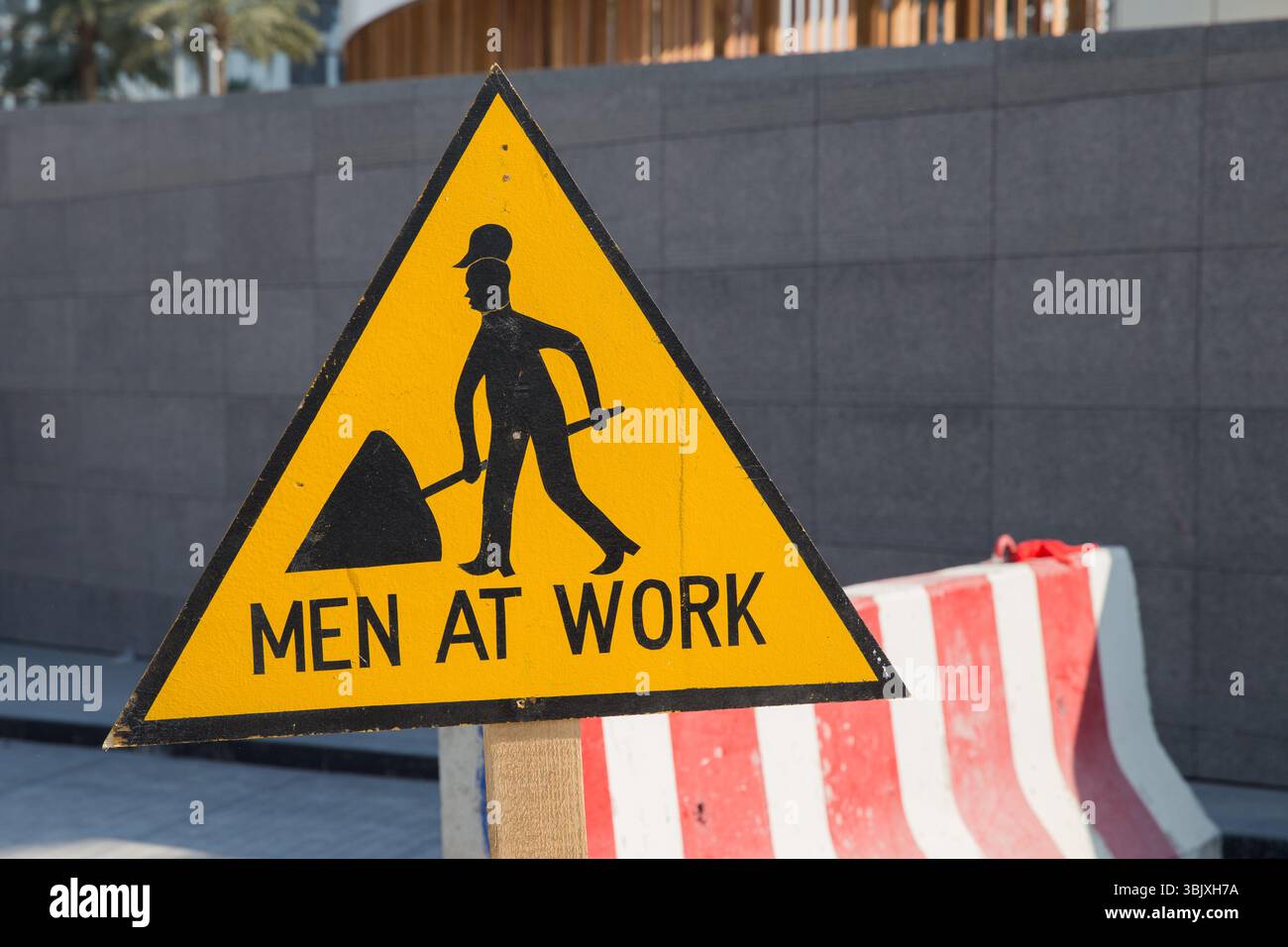 Men at work sign Stock Photo - Alamy