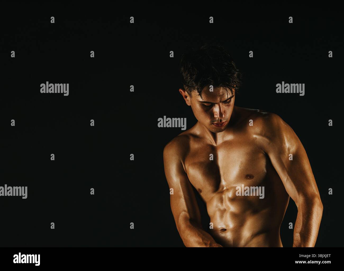 Artistic portrayal of a male figure in dramatic lighting and expressive ...