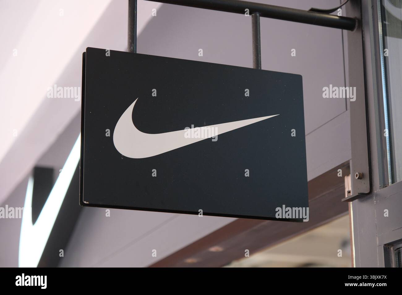Nike brand logo on hi-res stock photography and images - Alamy