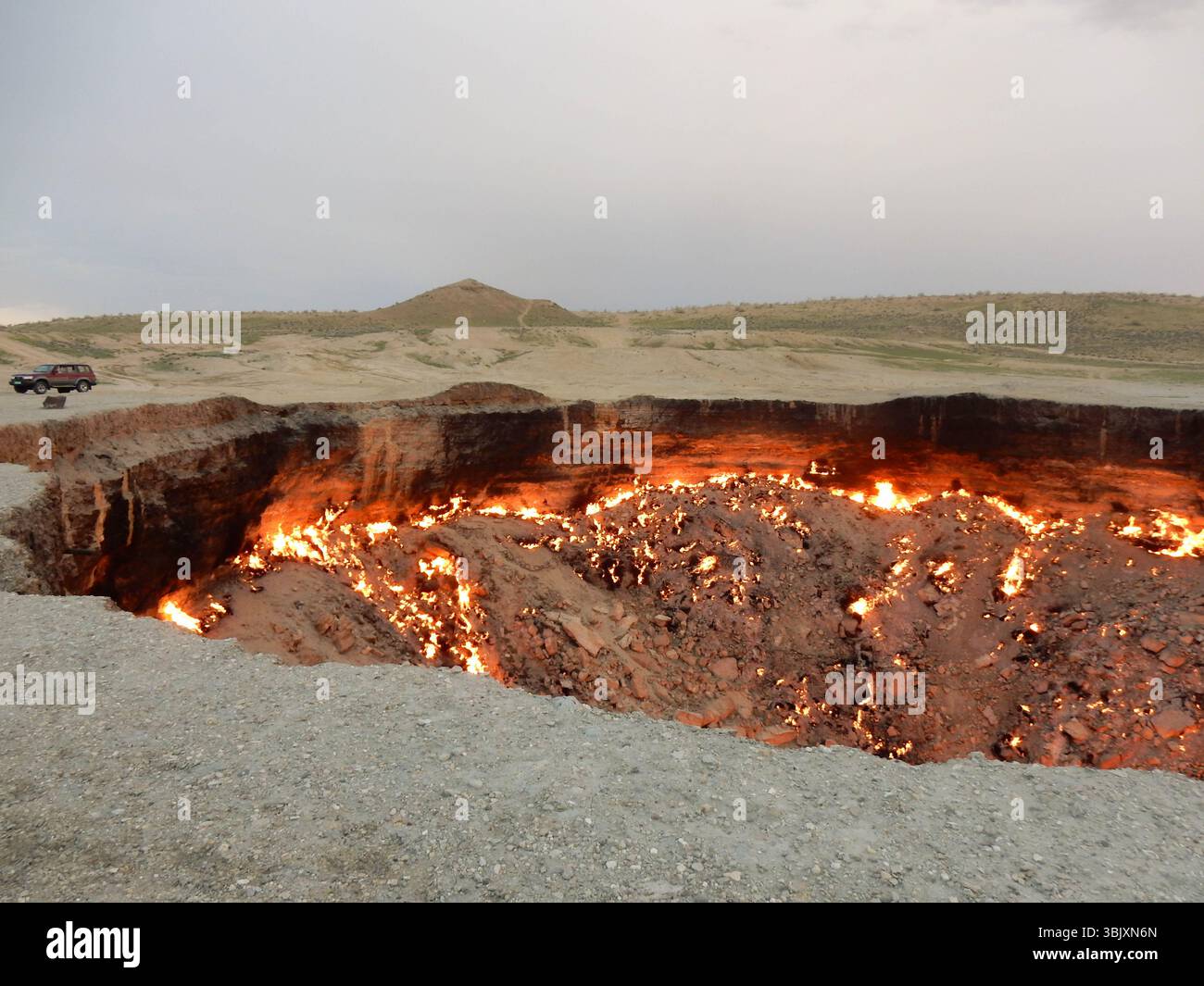 The Darvaza Gas Crater, also known as the Door to Hell in the desert in ...