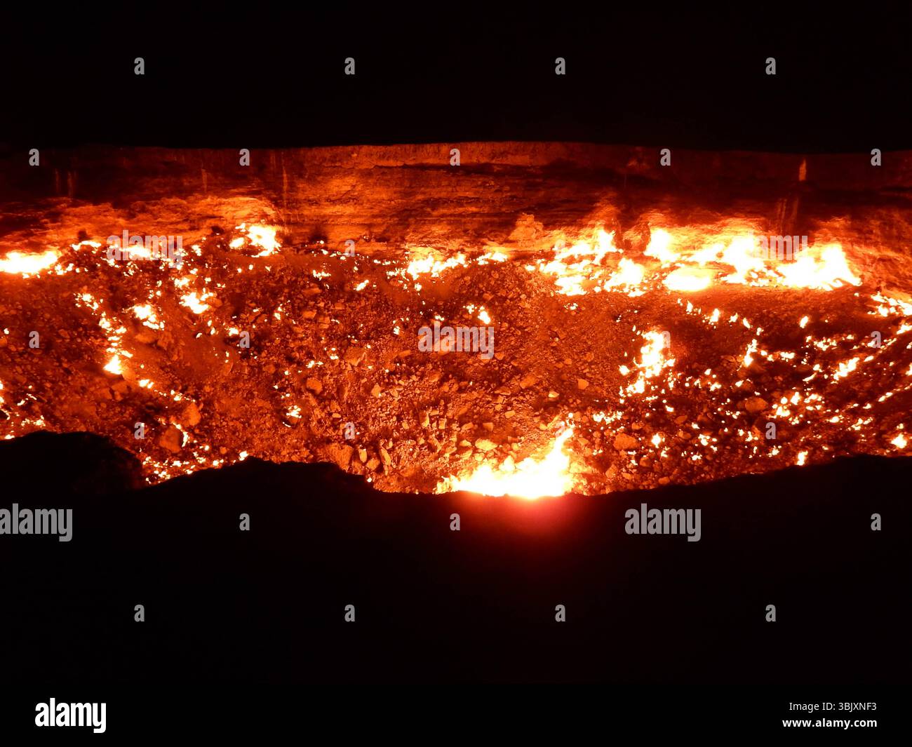 Night time at the Darvaza Gas Crater in Turkmenistan Stock Photo - Alamy