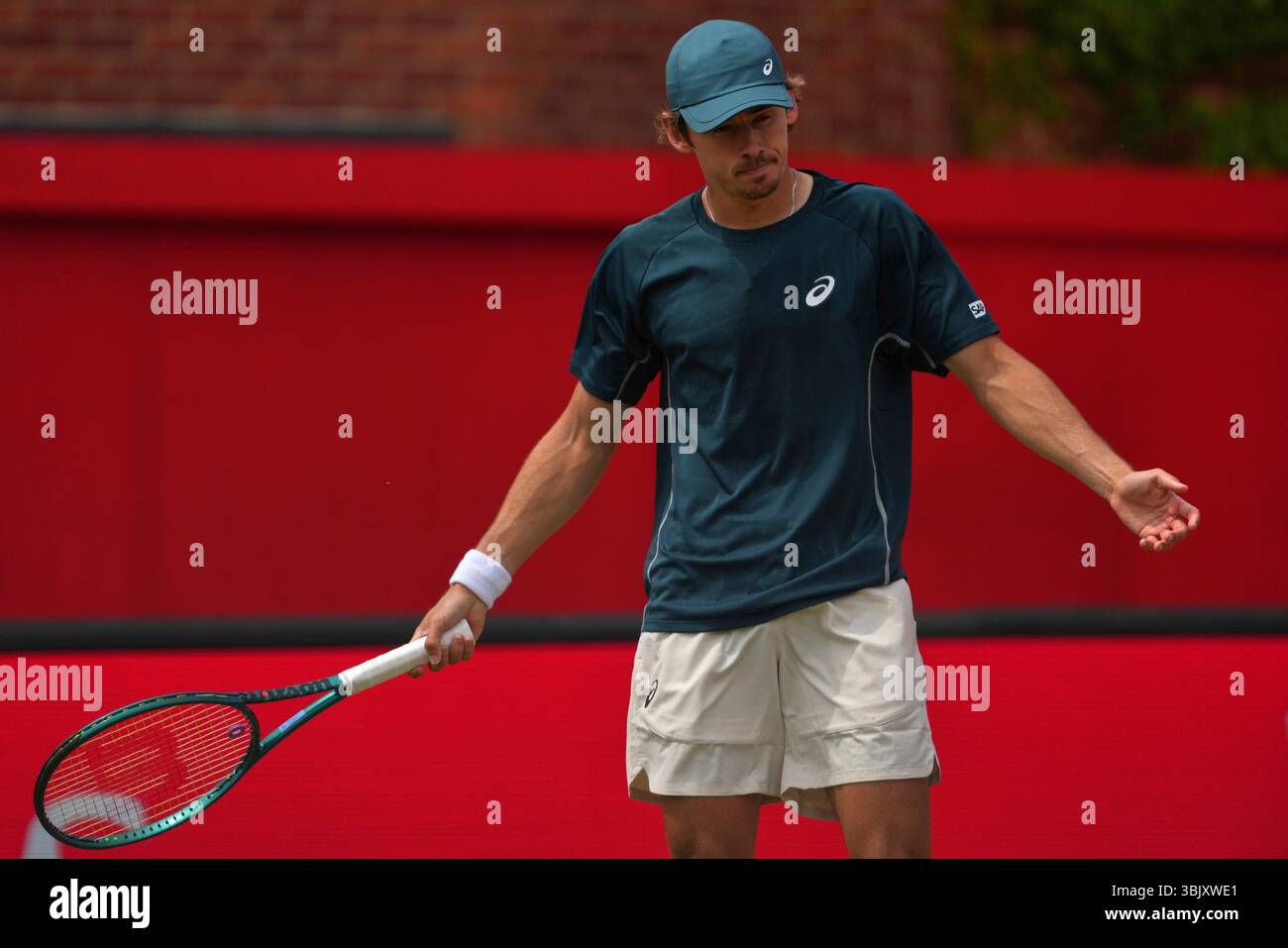 Australia's Alex de Minaur reacts as he plays Jiri Lehecka of the Czech ...