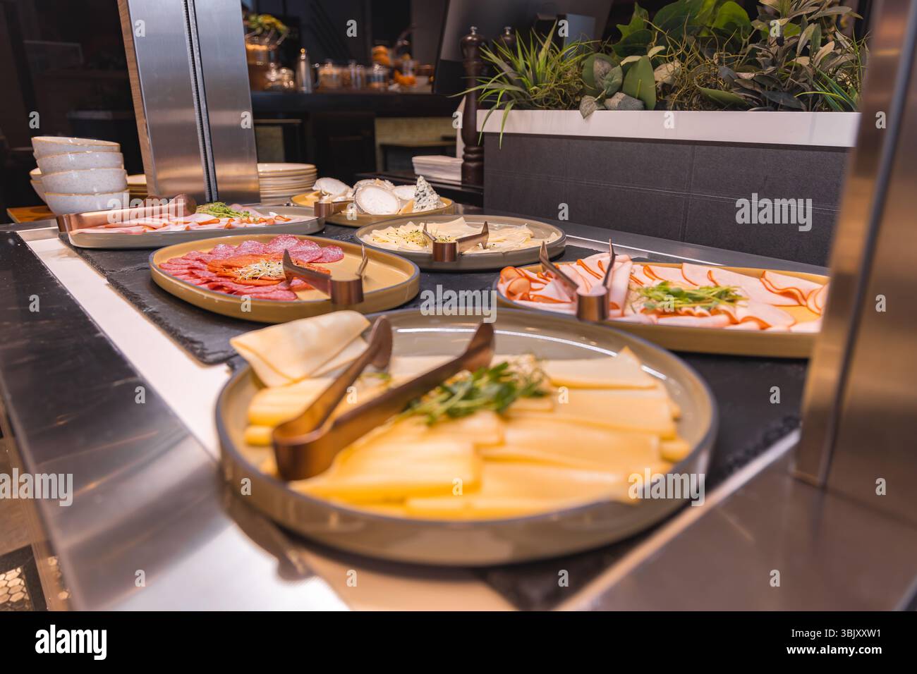 Hotel buffet counter plates hi-res stock photography and images - Alamy