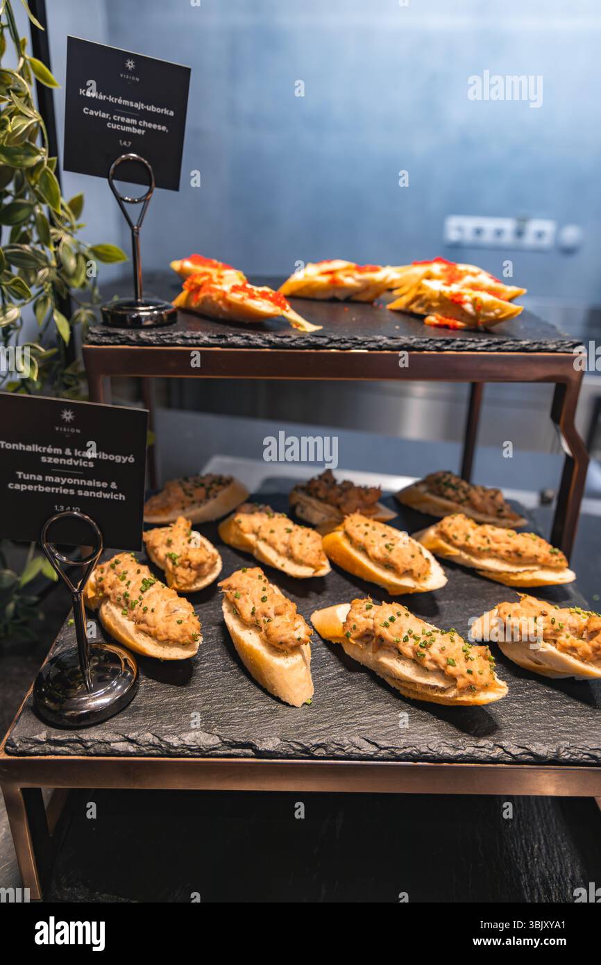 Two Tiered Display of Gourmet Appetizers in Luxury Hotel Setting Stock ...
