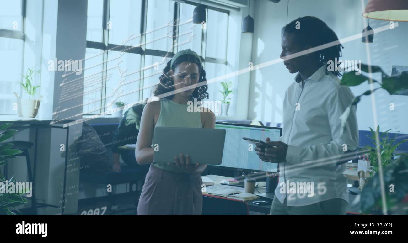 Reviewing software developers collaborating hi-res stock photography ...