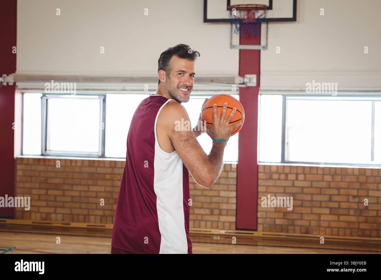 Male athlete under hoop holding hi-res stock photography and images - Alamy