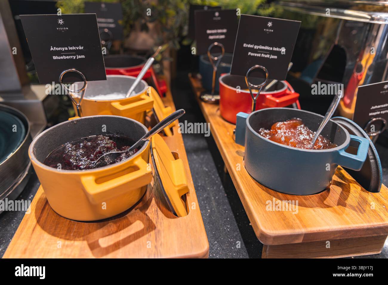Buffet Display of Jams in Ceramic Pots with Wooden Trays and Labels ...