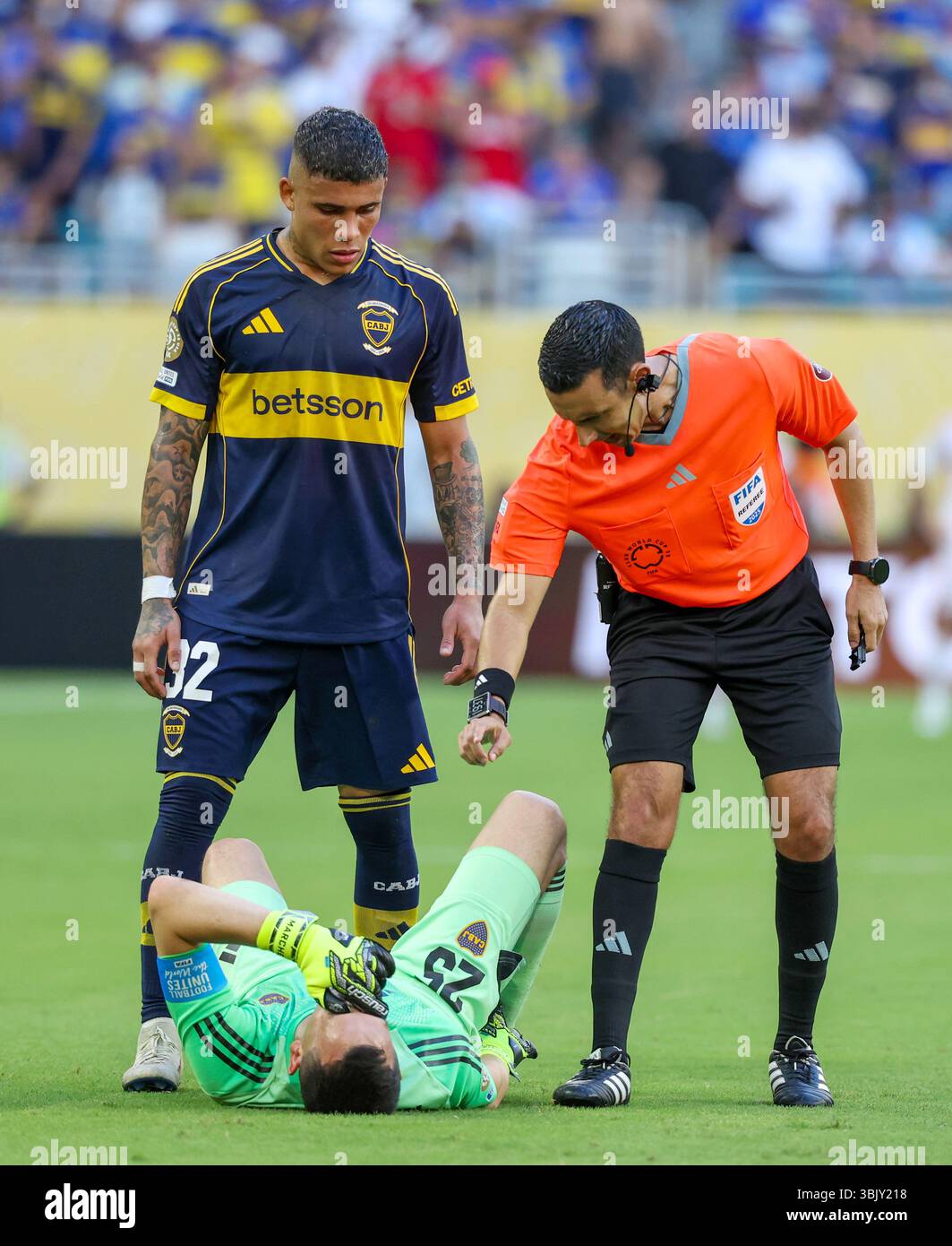 Miami Gardens, USA. 16th June, 2025. Referee Cesar Ramos talks to Boca ...