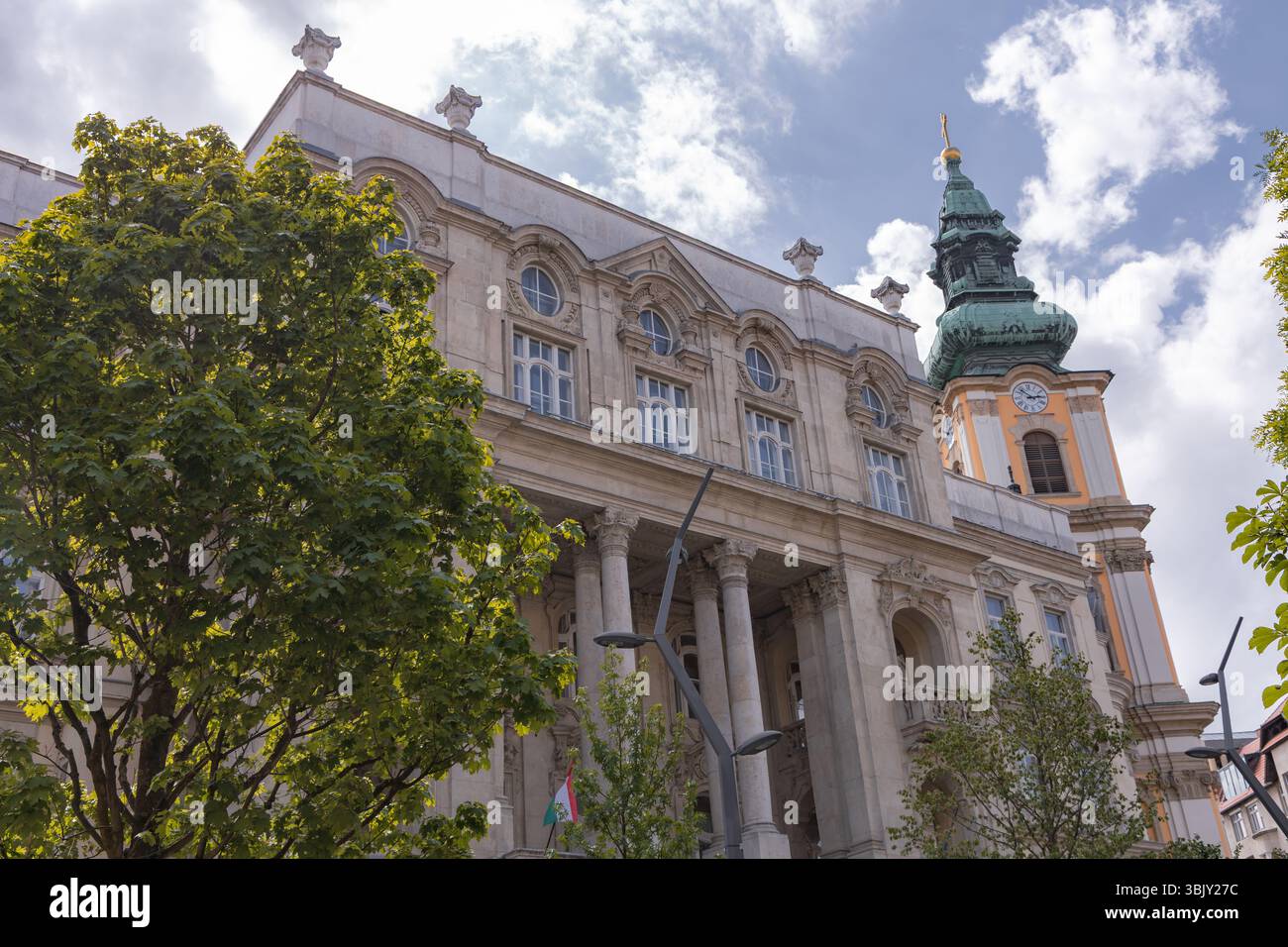 Historic Building with Green Domed Tower and Golden Spire Stock Photo ...