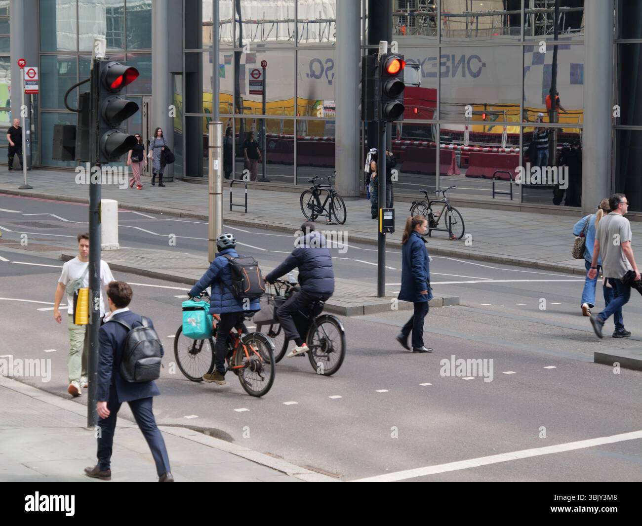 Delivery Cyclists in Bishopsgate, London, are observed jumping red ...