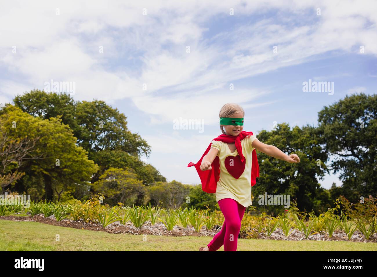 Child wearing superhero costume heart hi-res stock photography and ...