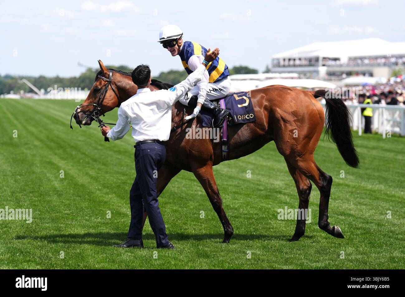 Jockey Mark Zahra celebrates after winning the Queen Anne Stakes with ...