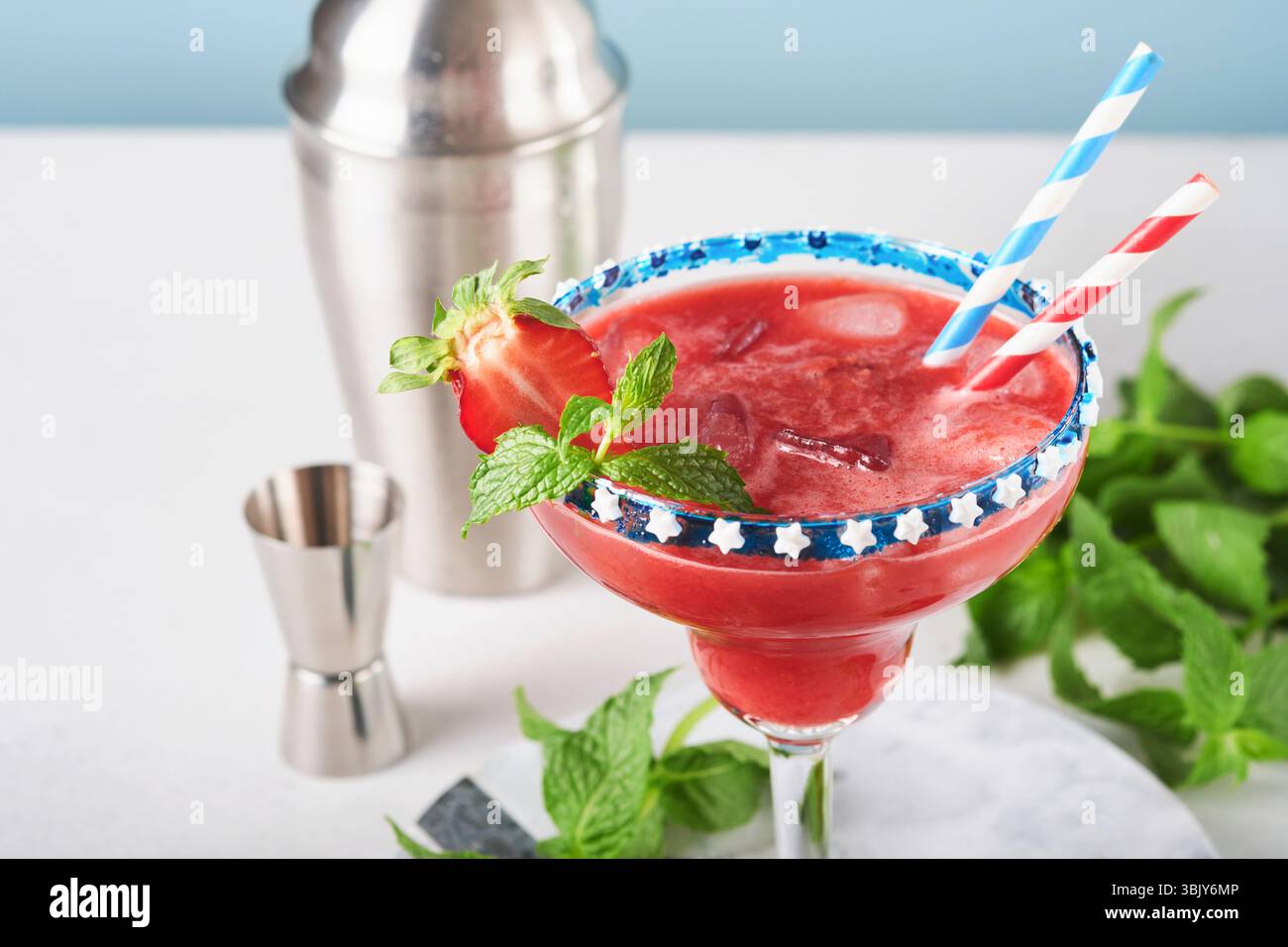 Patriotic Cocktail 4th july. Glass margarita cocktail with strawberry ...