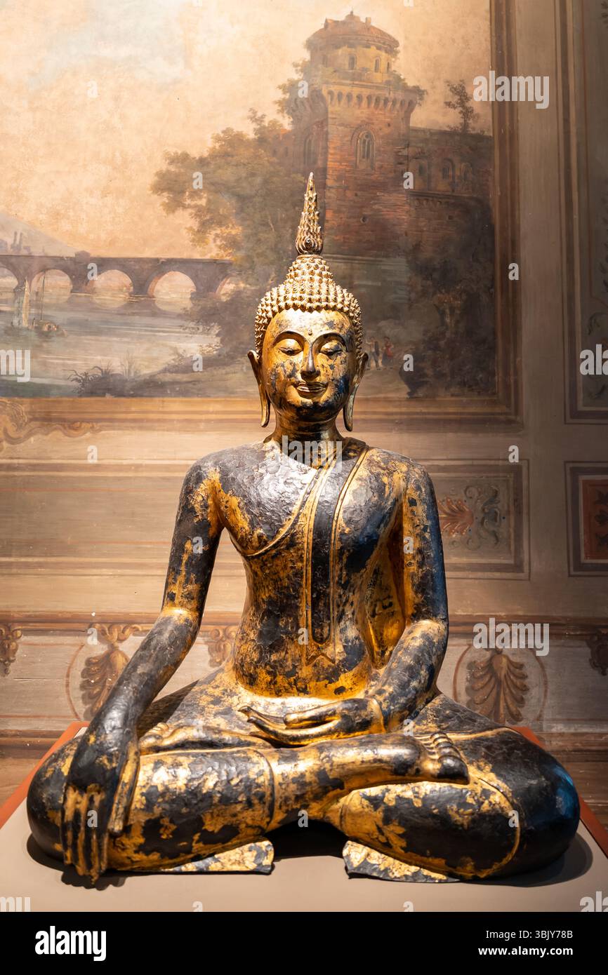 Stained big Buddha statue inside Oriental Art Museum in Turin Stock ...