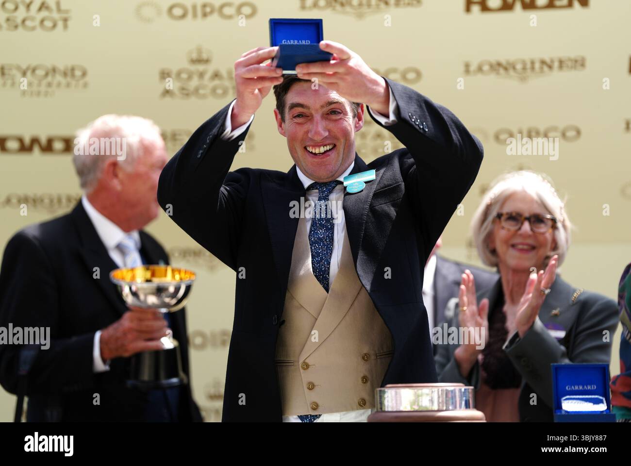 Trainer Harry Eustace celebrates after winning the Queen Anne Stakes ...
