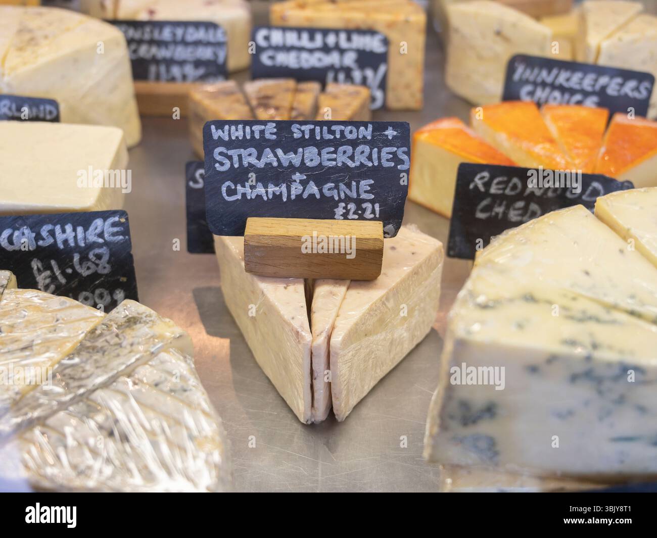 Local cheeses in a cheeseshop in the Peak District, England, UK Stock ...