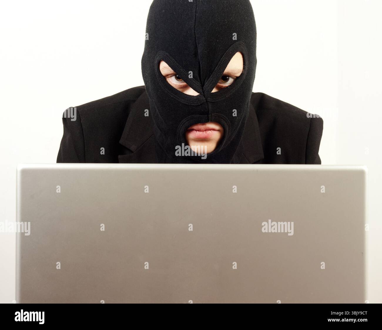 Hacker girl woman using laptop hi-res stock photography and images - Alamy