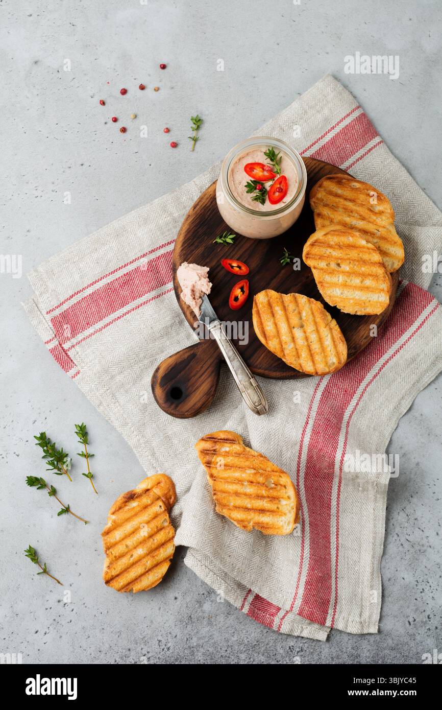 Chicken homemade pate from liver with red pepper, thyme twigs and ...