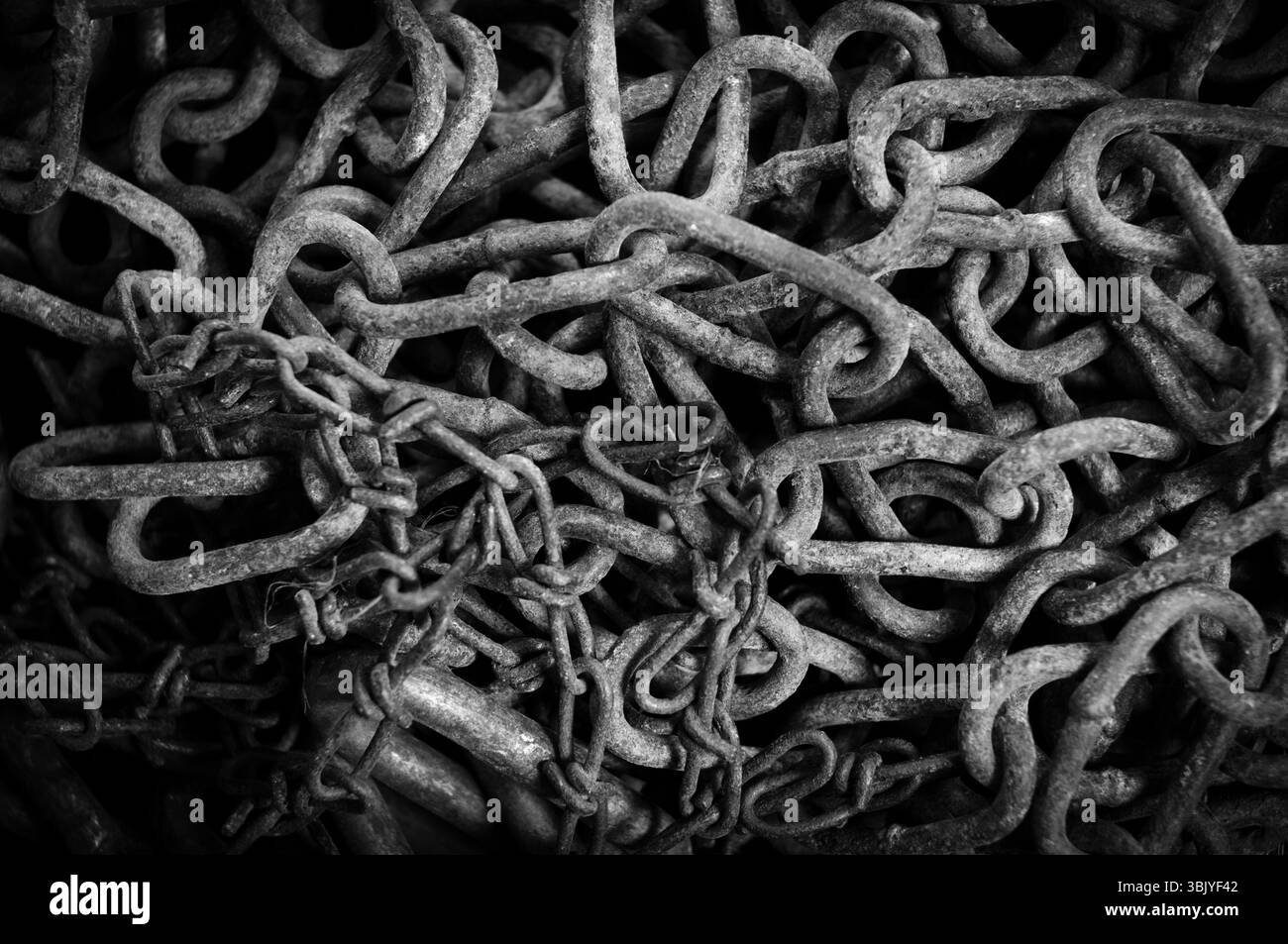 Closeup old black chain Black and White Stock Photos & Images - Alamy
