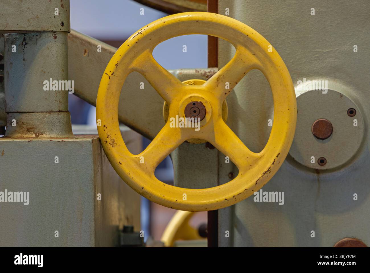 Hand turning yellow valve hi-res stock photography and images - Alamy
