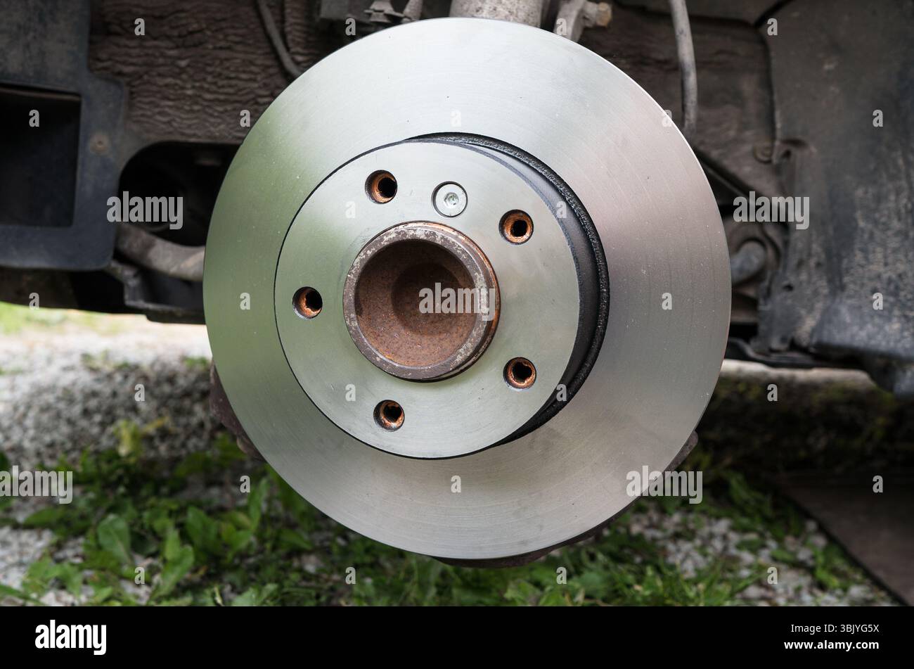Disc is ready for repair. Car brake system Stock Photo - Alamy