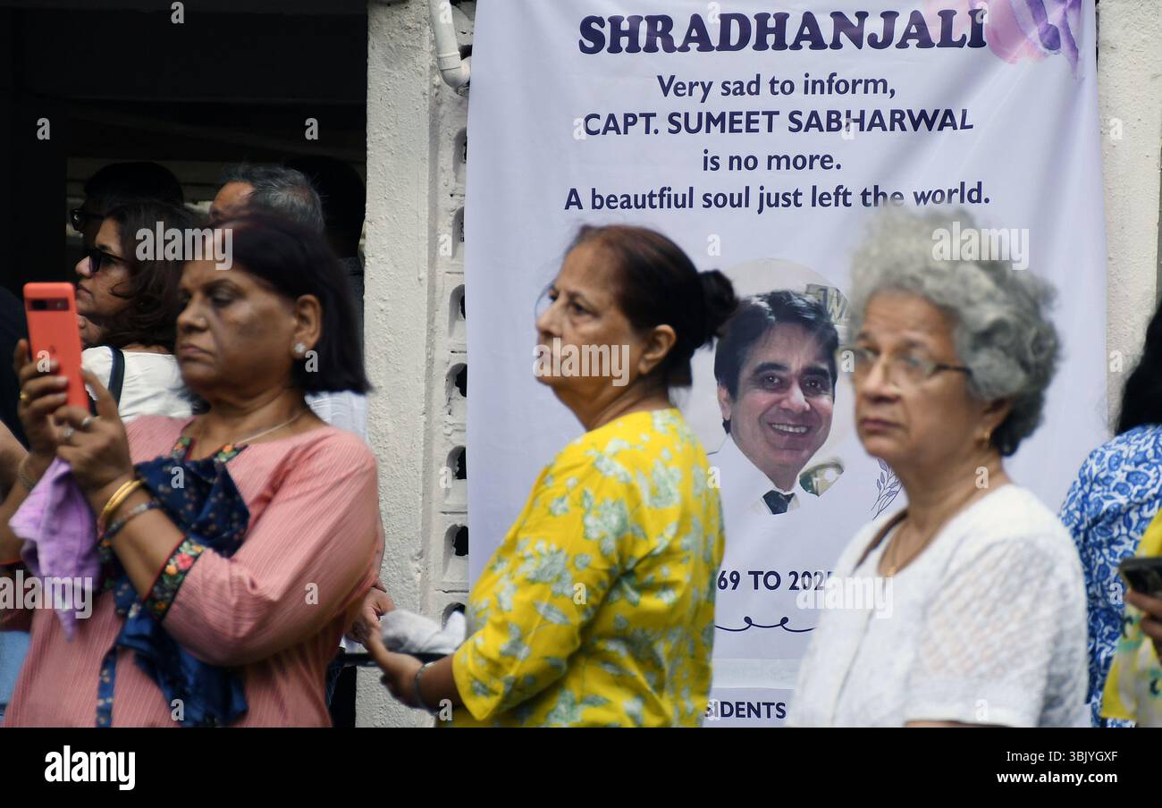 Building members seen waiting for the mortal remains of Captain Sumeet ...