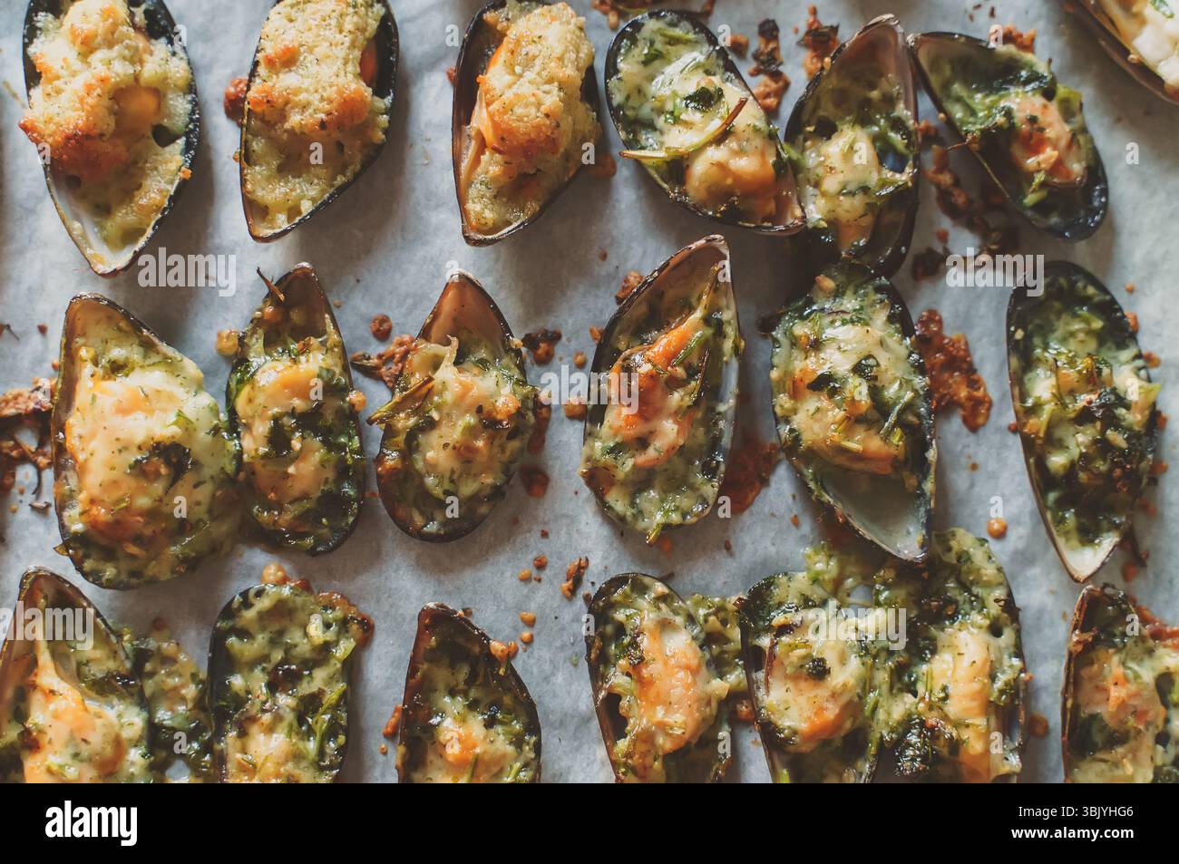 Baked stuffed fresh mussels in shell Stock Photo - Alamy
