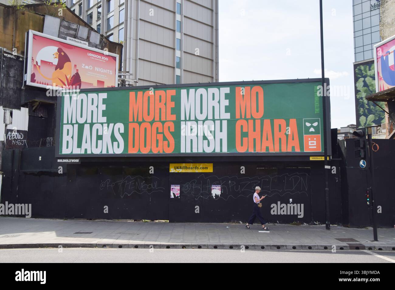London, UK. 17th June 2025. A billboard with the slogan 'More Blacks, More Dogs, More Irish, Mo ...