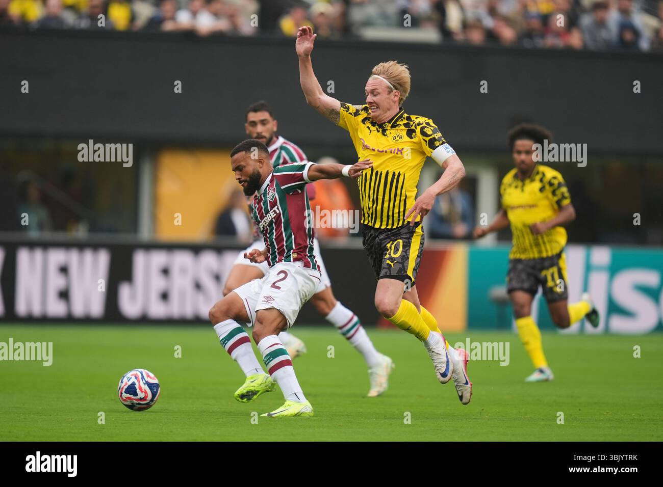 Borussia Dortmund's Julian Brandt (10) and Fluminense's Samuel Xavier ...