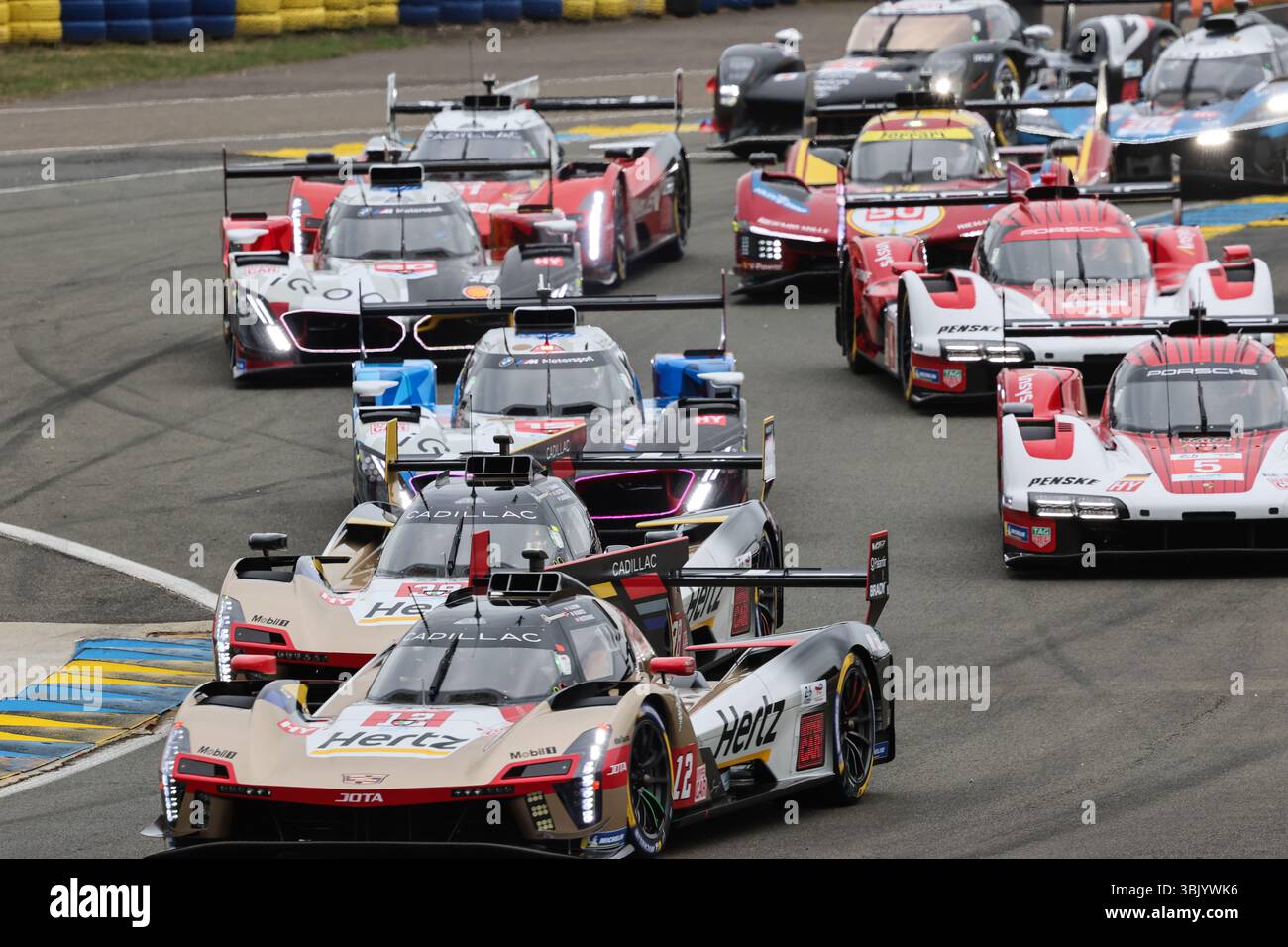 Le Mans 24 Hours 2025 June 14/15 2025 Alex Lynn Cadillac 12 Leads the race into first corner at ...