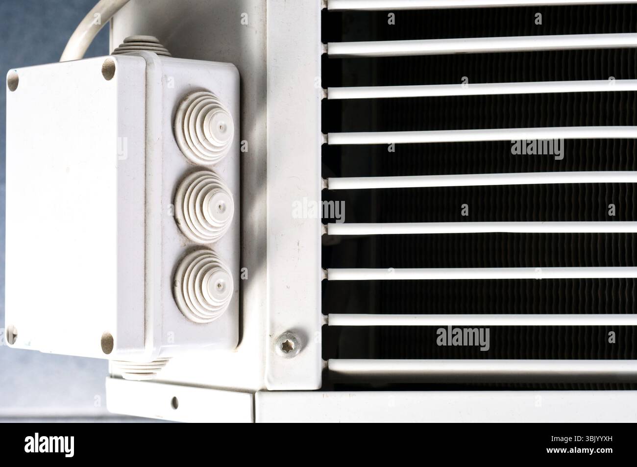 An electrical box with an air conditioner Stock Photo - Alamy