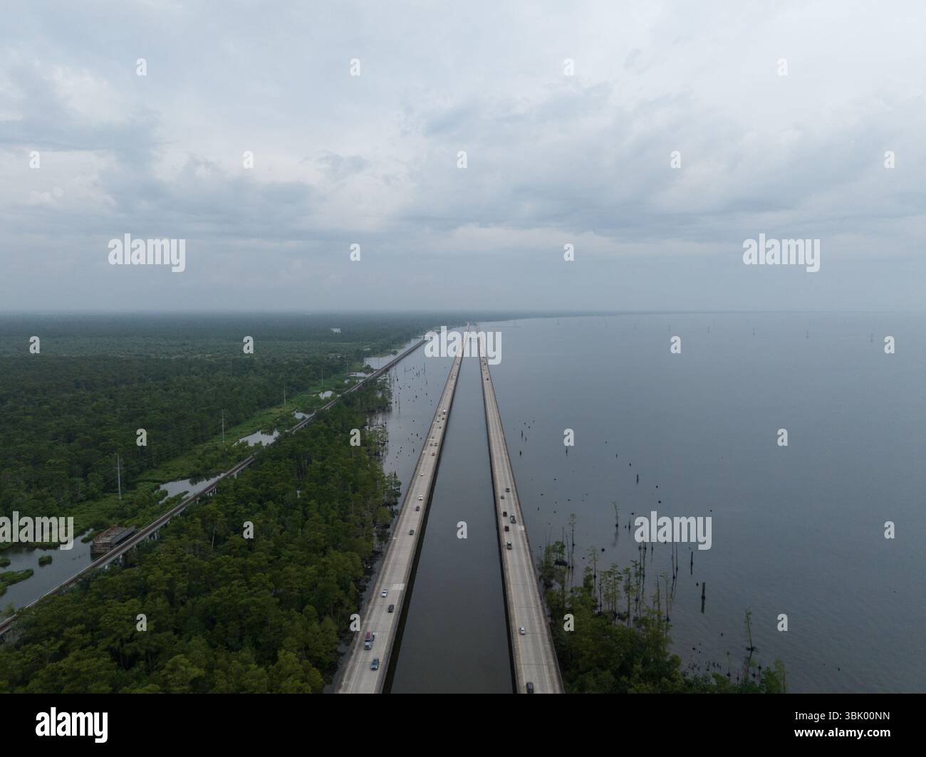 Aerial view of I-10 Bonnet Carré Spillway Bridge crossing Louisiana wetlands approaching New ...