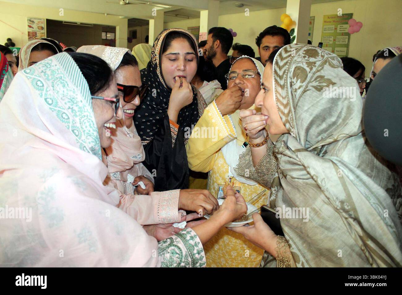 Students and staff members are celebrating the Eid Milan Party on the ...