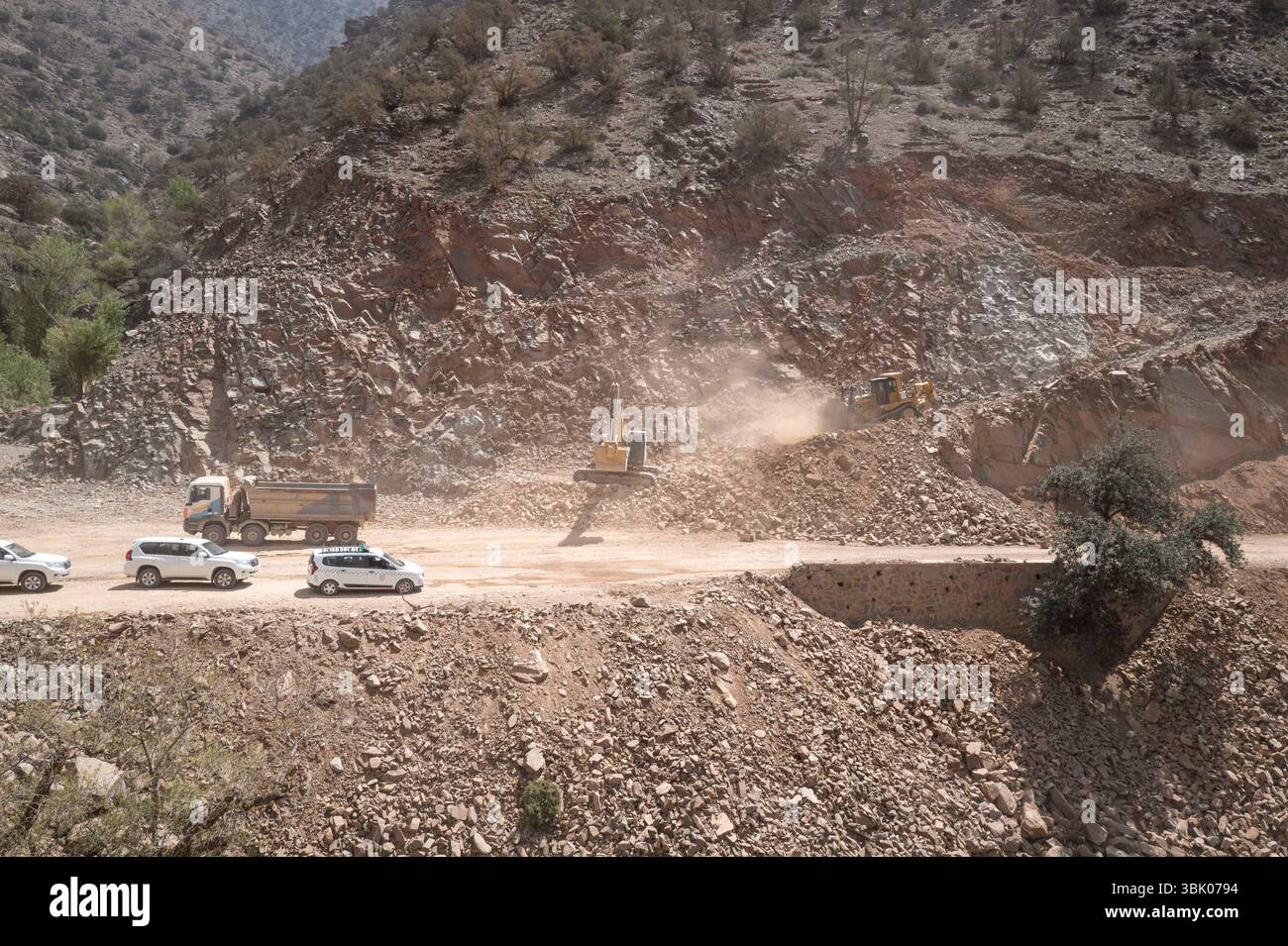 The N7 road under construction, tourist cars stopped while the workers ...