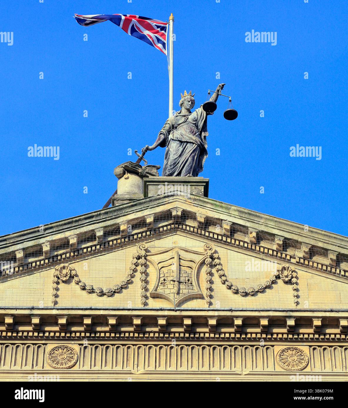 Statue figure representing Justice and the union flag on the roof of ...