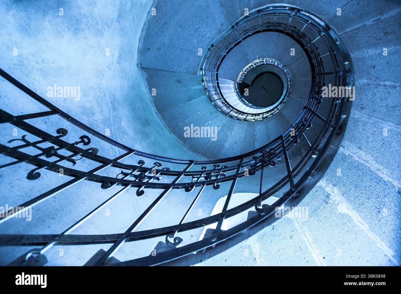 Round stairs in a church angle shot Stock Photo - Alamy