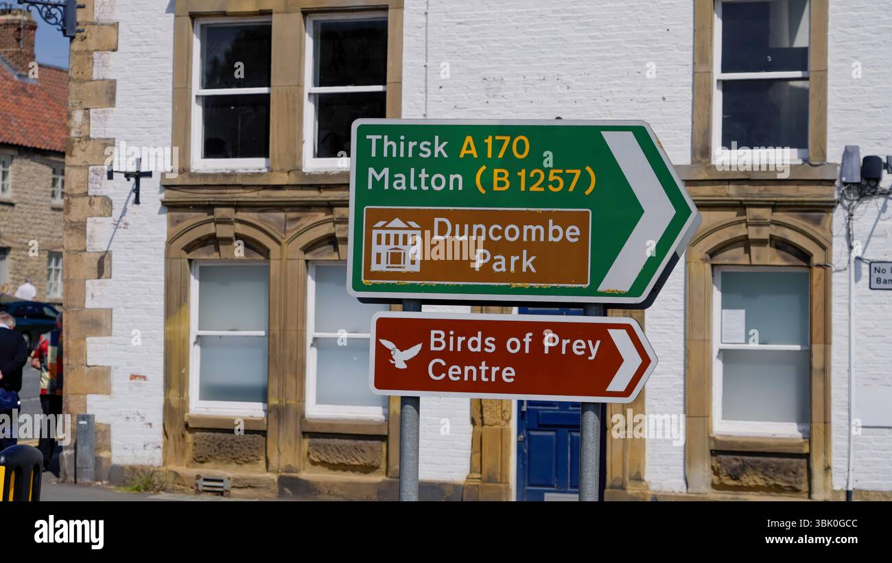 HELMSLEY, UK - JUNE 12, 2025 - Directional road signs in Helmsley ...