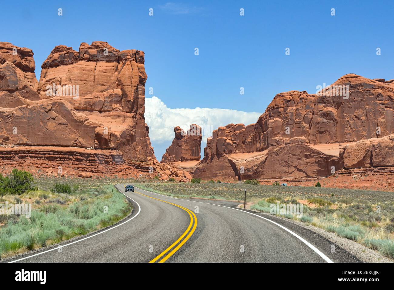 Moab, Utah, USA - 25 May 2025: Car driving through spectacular ...