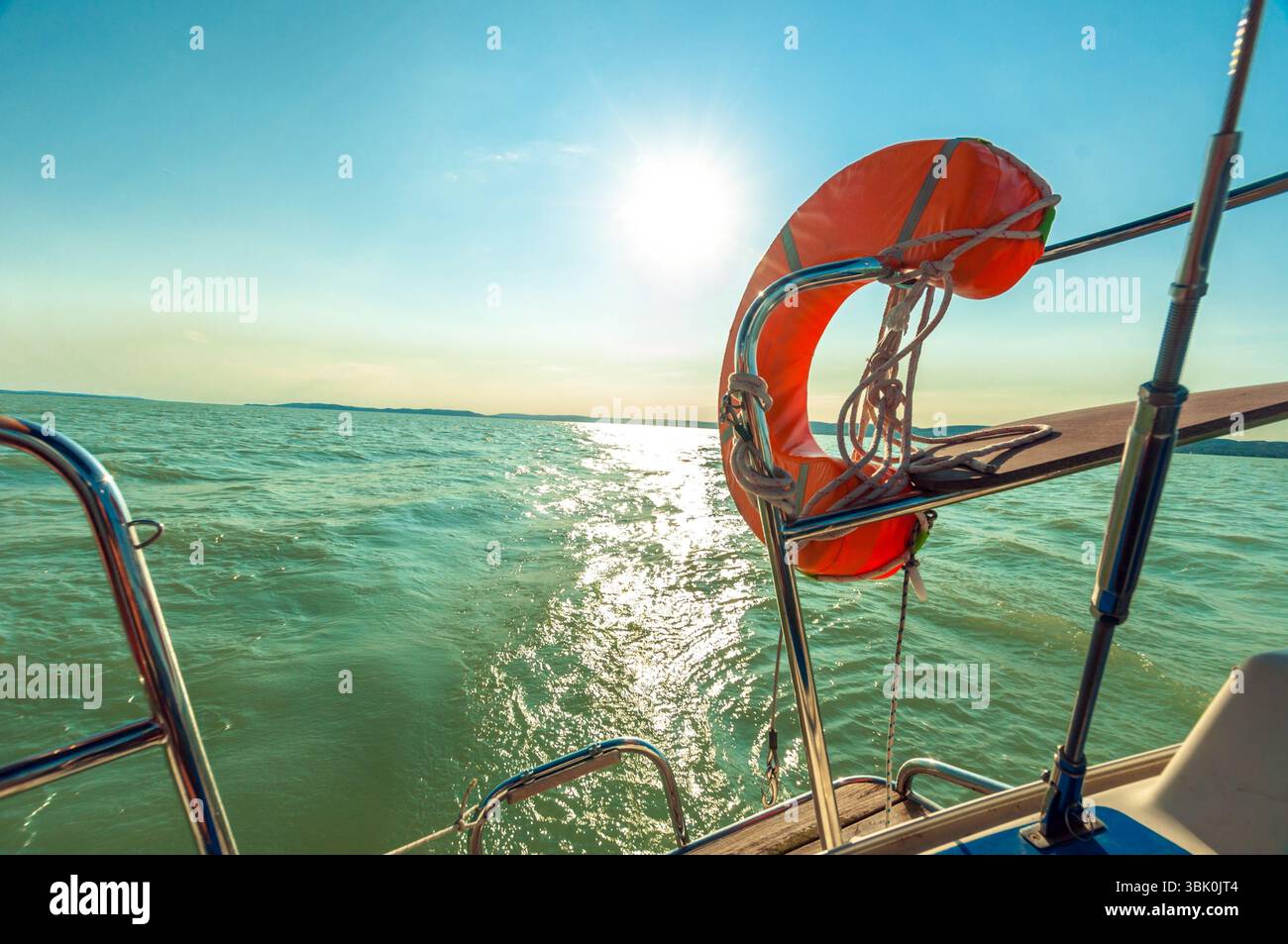 Sailing boat falling sun hi-res stock photography and images - Alamy