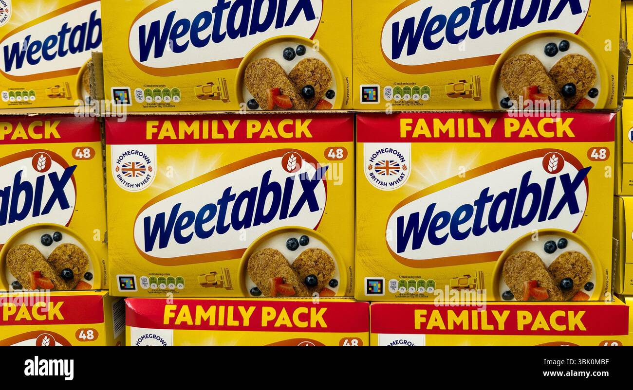 LONDON, UK - JUNE 14, 2025 - Multiple yellow Weetabix family packs, a ...