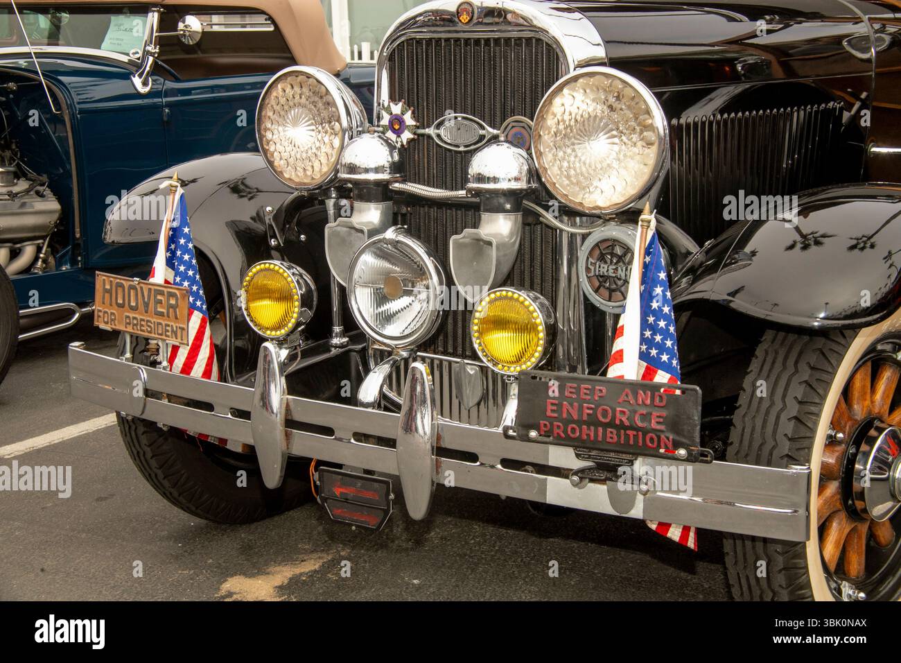 a 1926 Oldsmobile station wagon is displayed at a Newport Beach, CA ...
