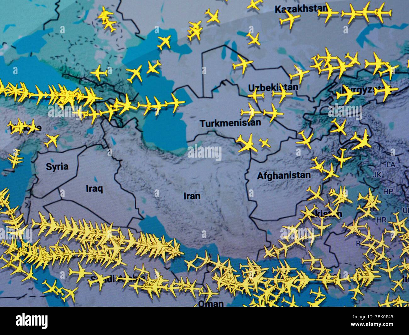 A Flightradar map shows numerous yellow airplane icons, indicating air ...