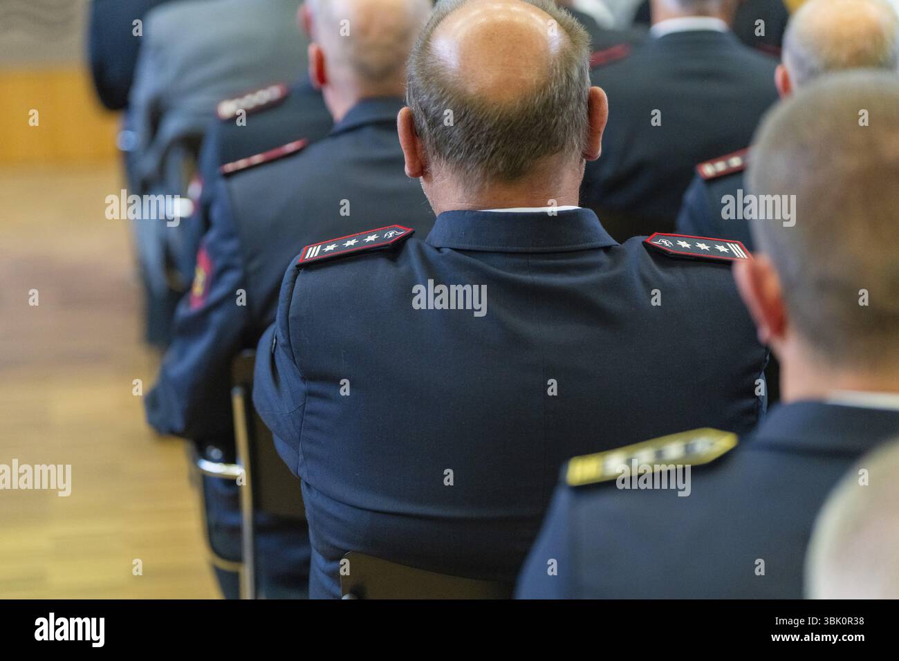 Men in uniforms sitting hi-res stock photography and images - Alamy