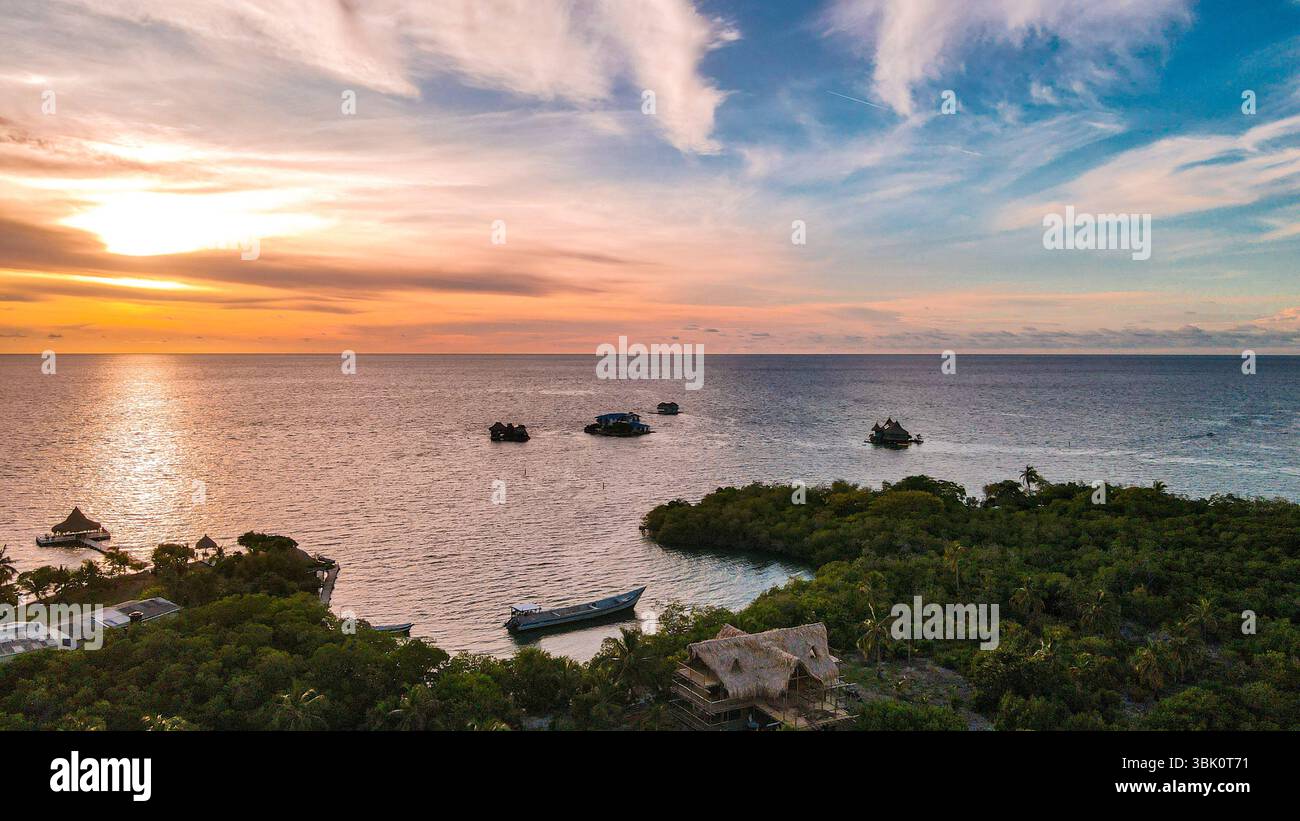 Breathtaking sunset view over San Bernardo Archipelago, featuring lush ...