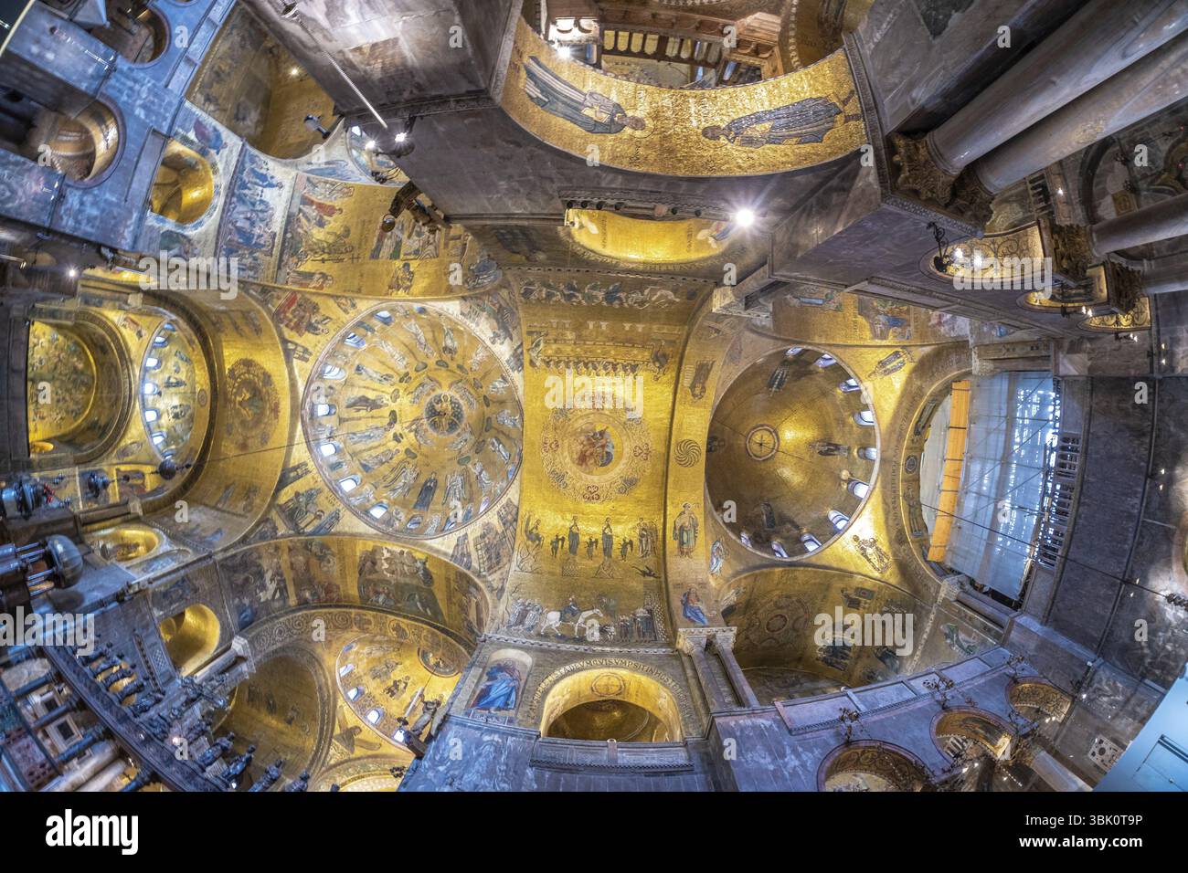 Wide angle view of the magnificent golden mosaics covering the ceiling ...