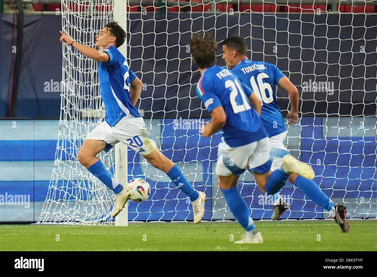 Italy's Niccolo Pisilli, left, celebrates after scoring during the ...