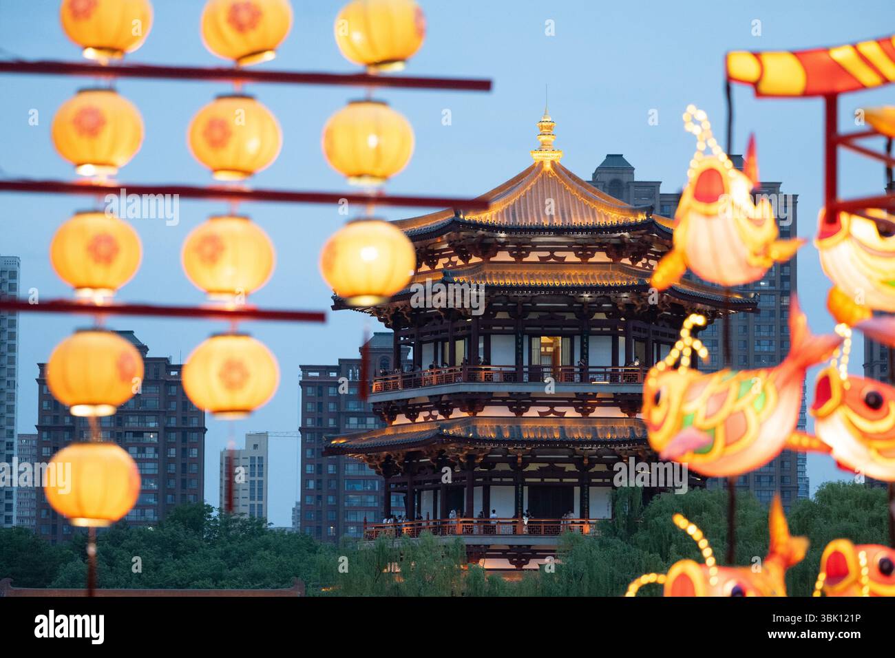 02 May 2025, China, Xi·an: Fish lanterns hang in the Tang Paradise ...