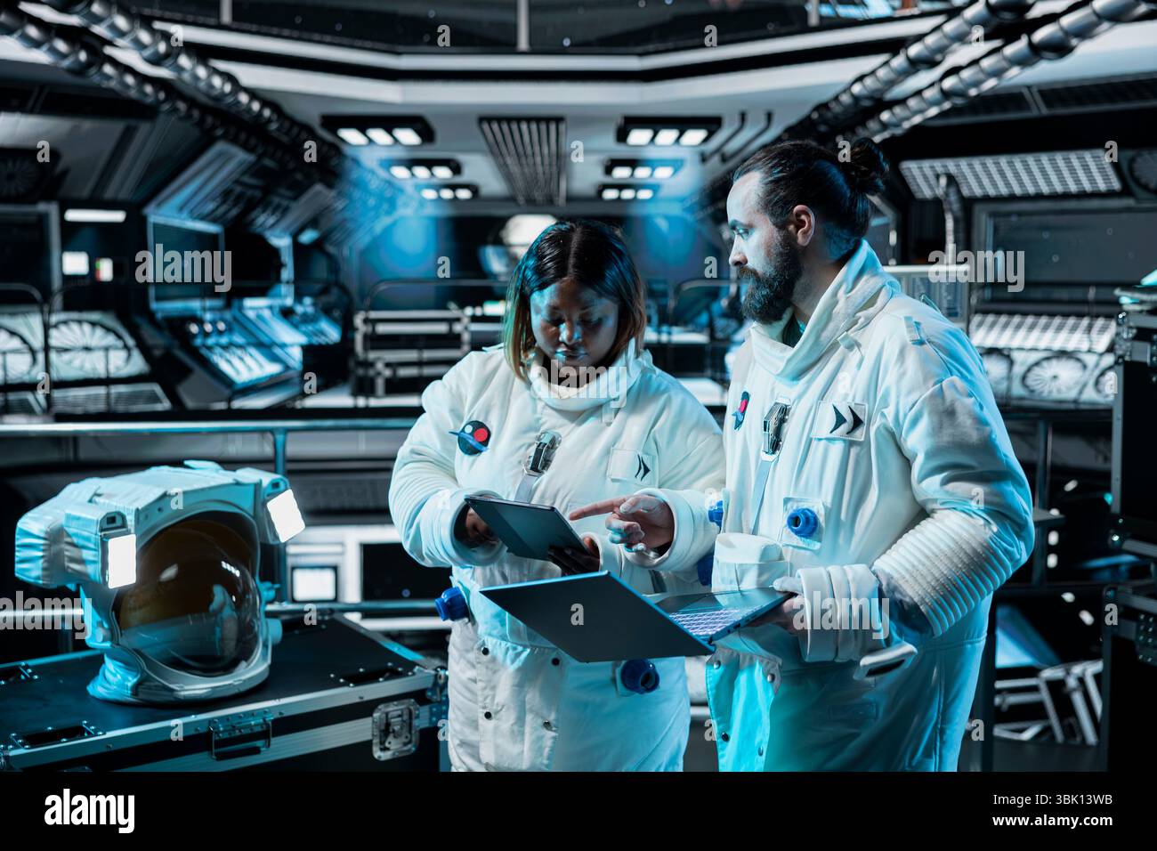 Astronauts monitoring life support systems, conducting safety checks ...